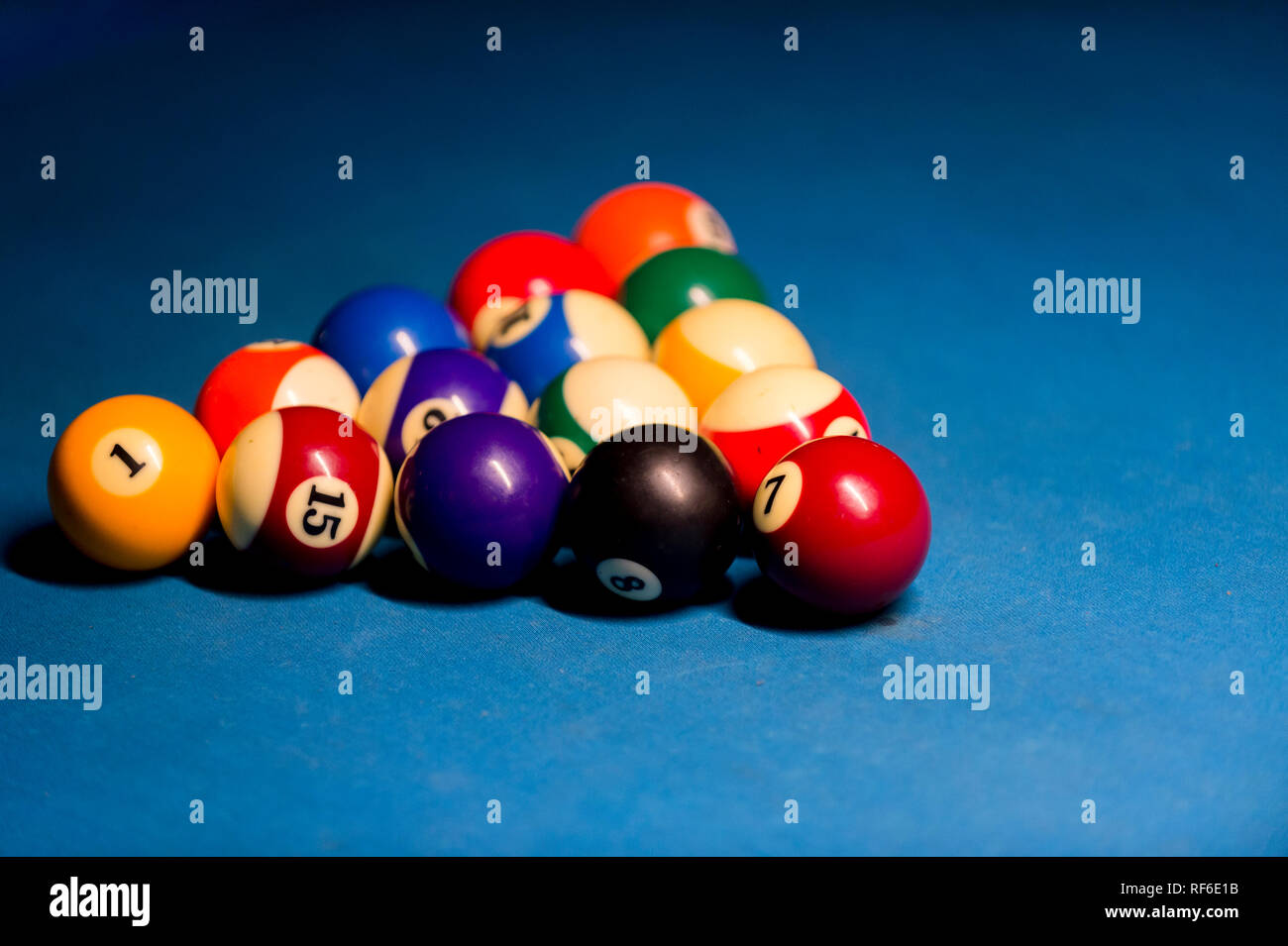 Billiard balls on pool blue table - sport background Stock Photo - Alamy