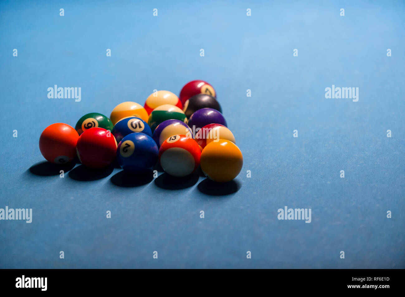 Billiard balls on pool blue table - sport background Stock Photo - Alamy