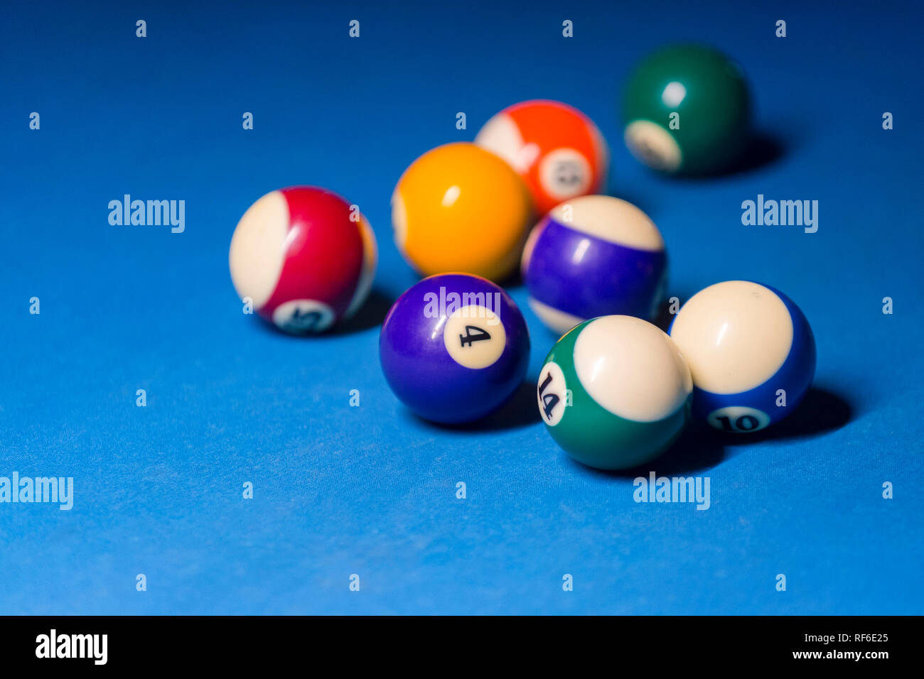Billiard balls on pool blue table - sport background Stock Photo - Alamy