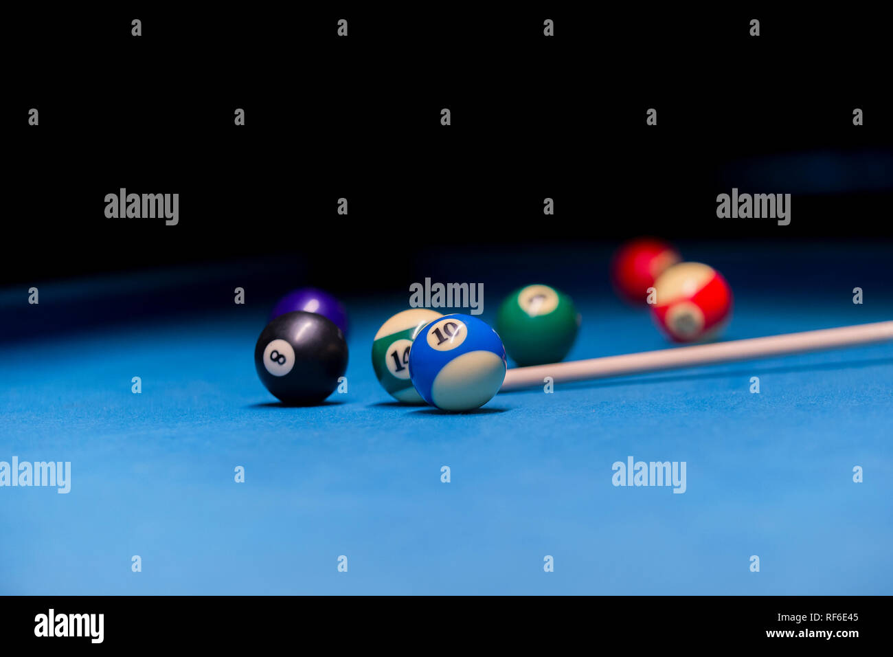 Billiard balls on pool blue table - sport background Stock Photo - Alamy