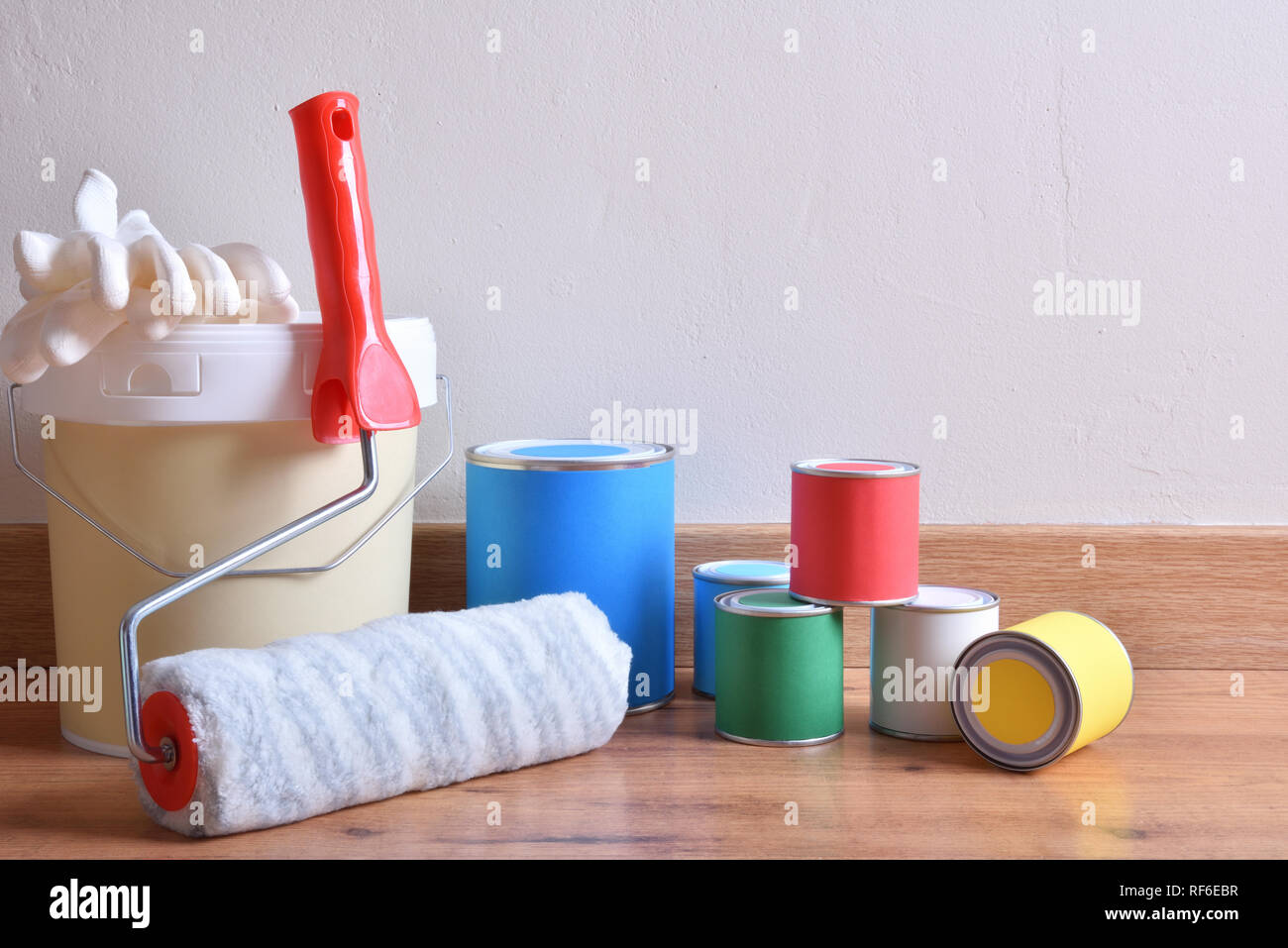 Painting tools for home on table with white wall background in a room ...