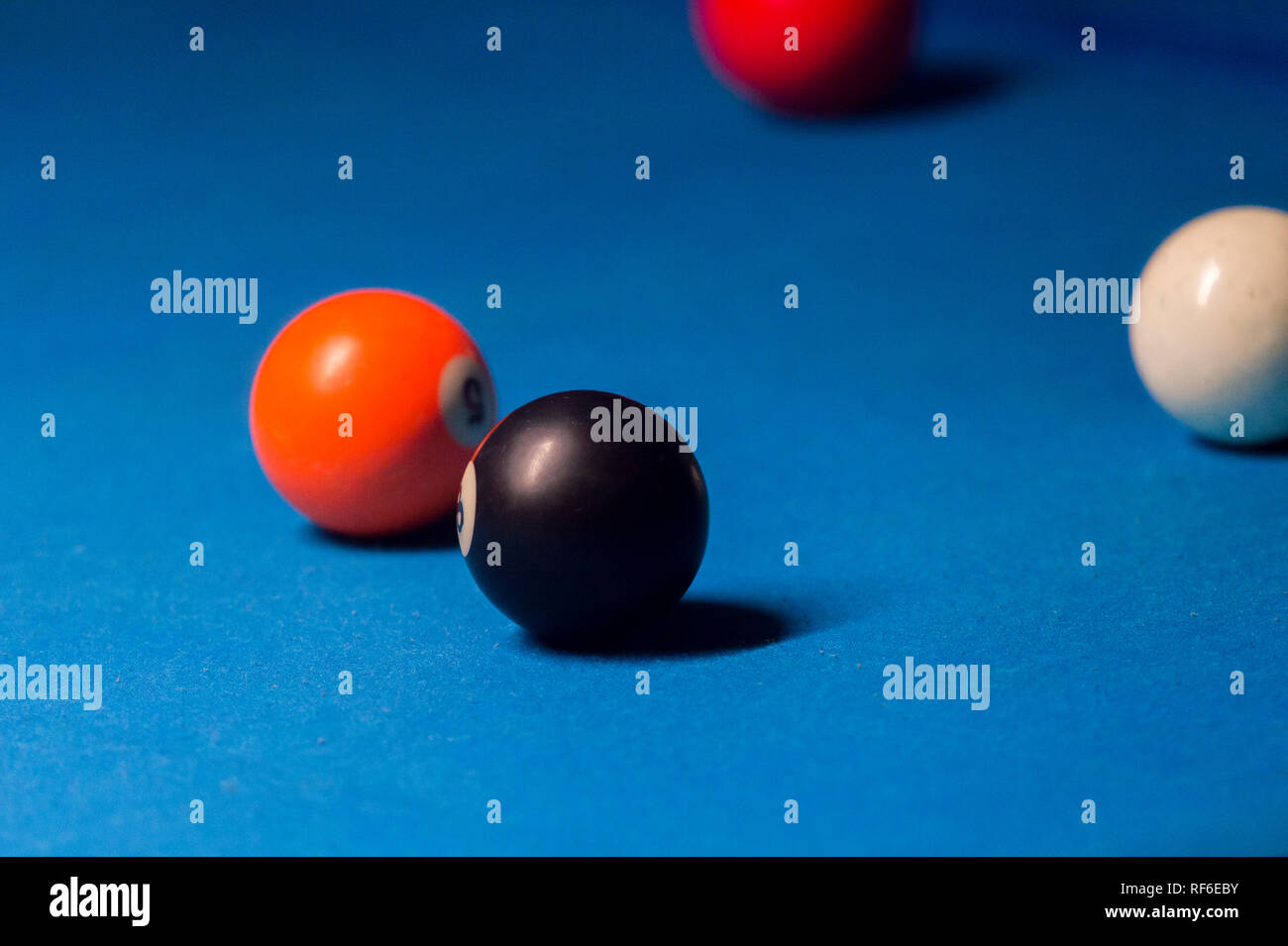 Billiard balls on pool blue table - sport background Stock Photo - Alamy