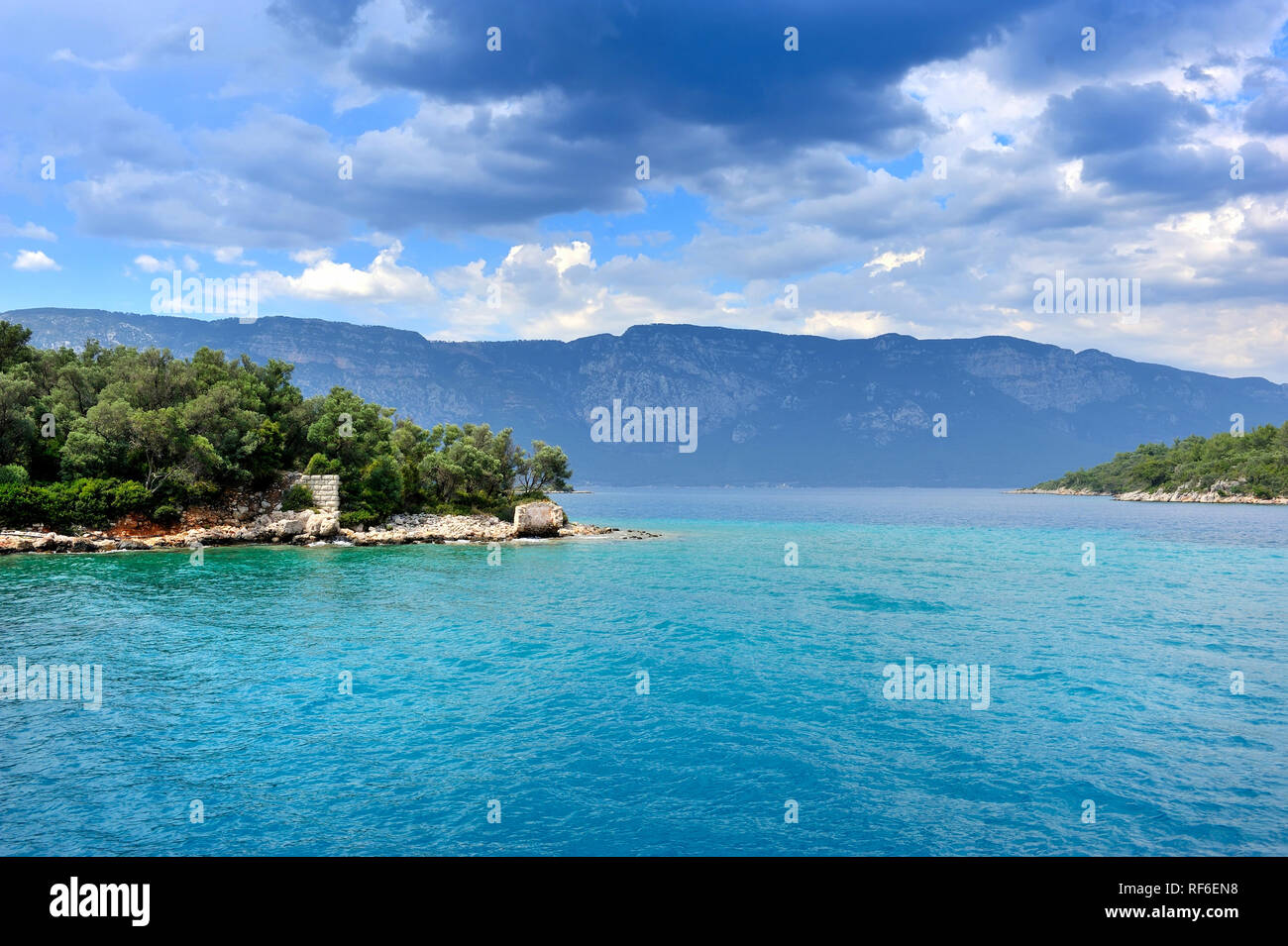 Beautiful seascape with island and the ruins of the old building ...