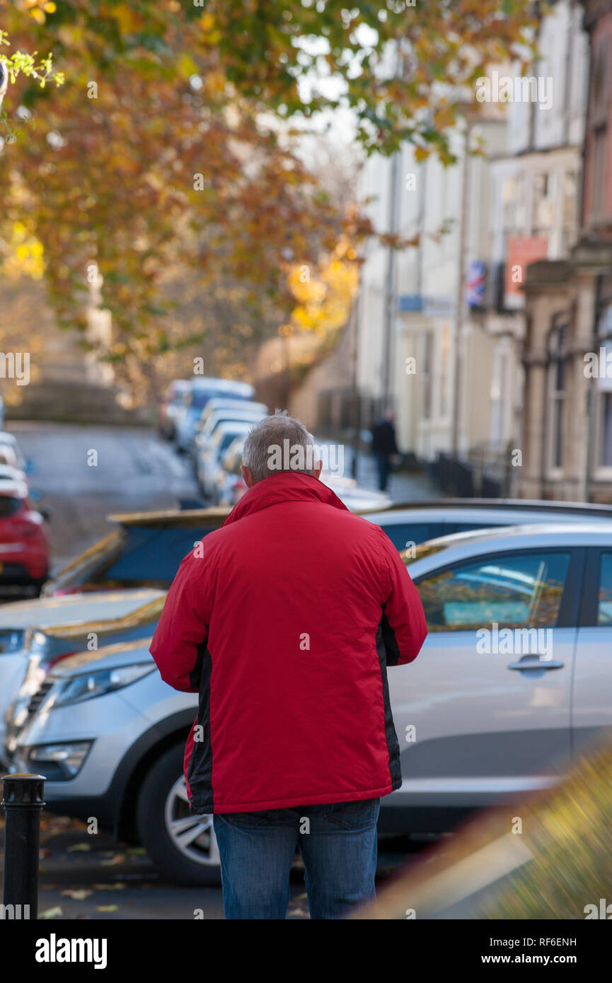 Walk autumn leaves man hi-res stock photography and images - Alamy