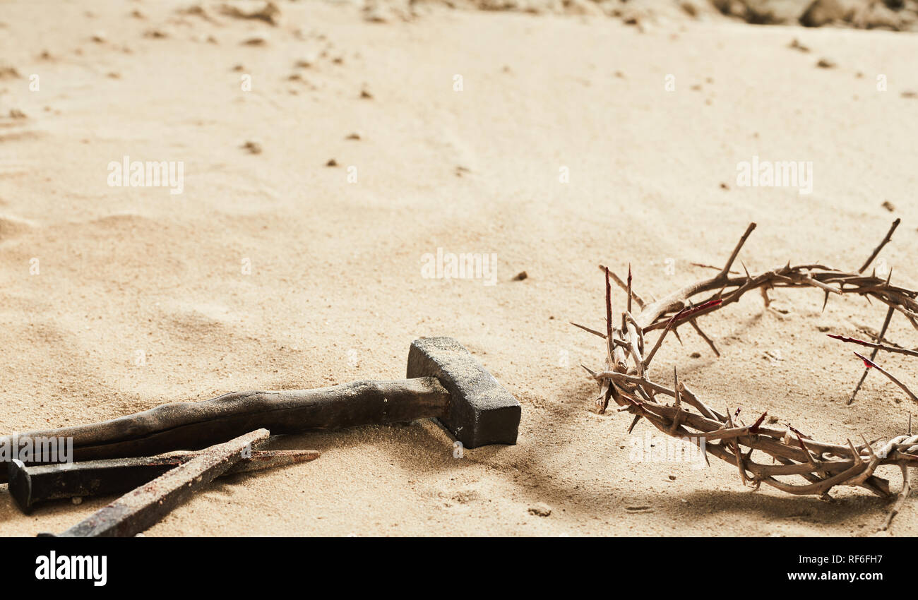 Religious Easter background with crown of thorns, a large old iron nail ...