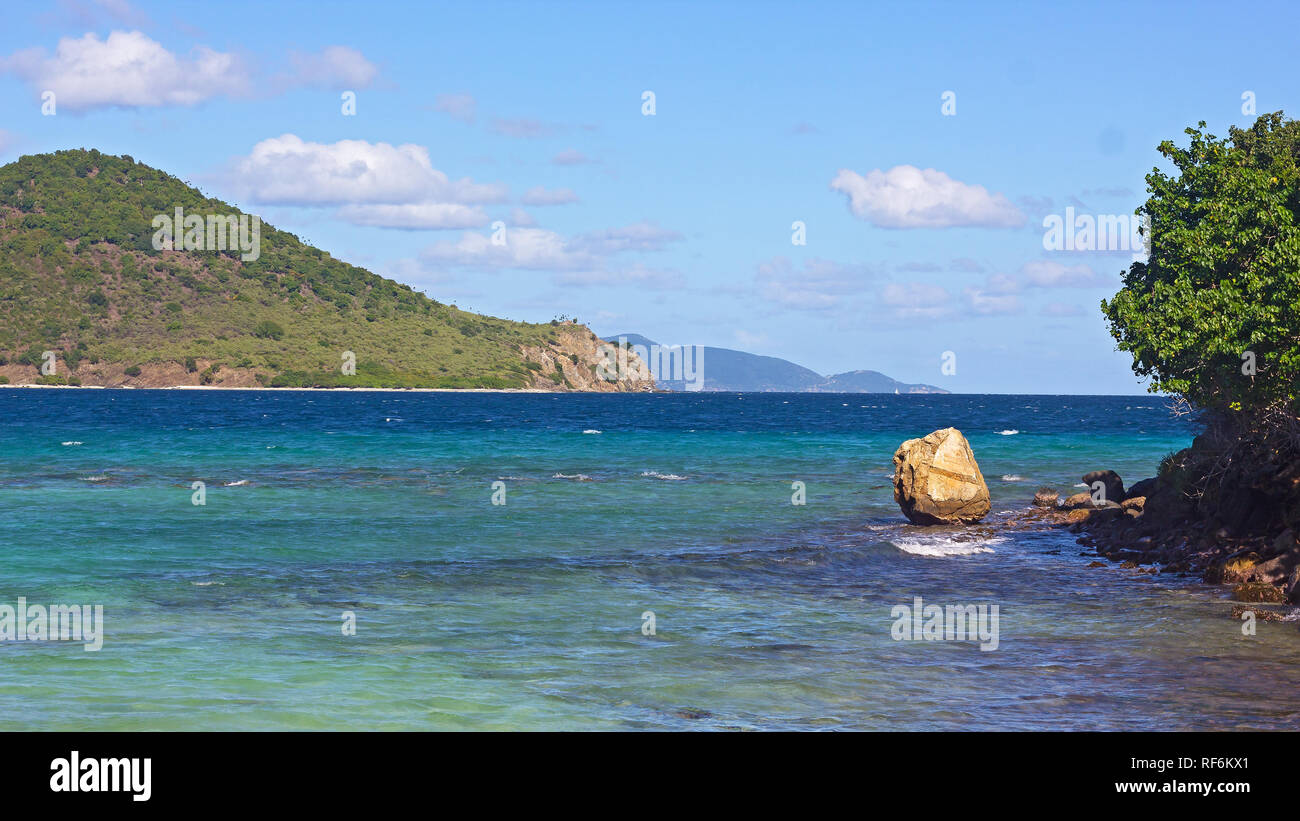 Tropical island landscape with sea view and several mountainous islands ...