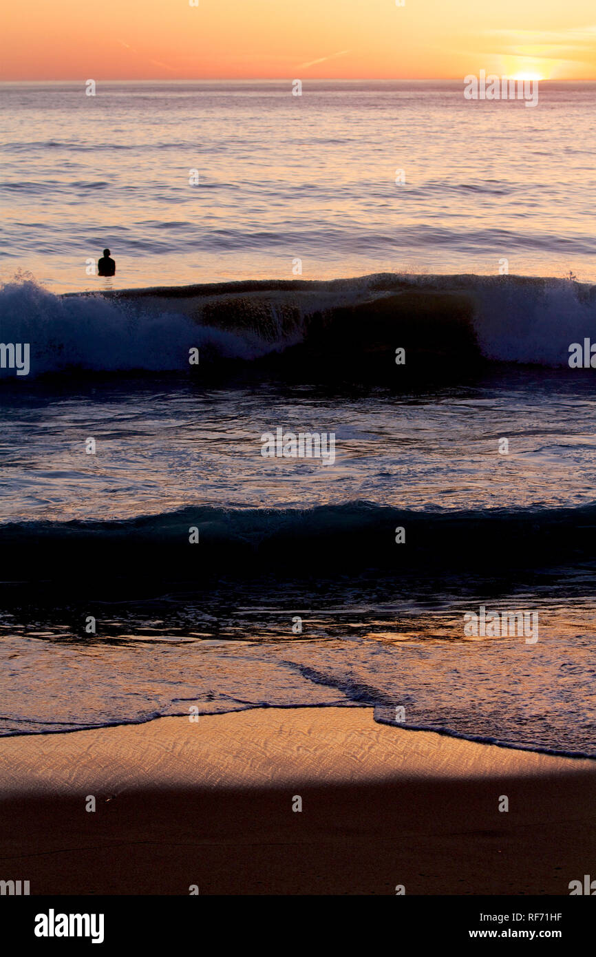 Surfing wading hi-res stock photography and images - Alamy