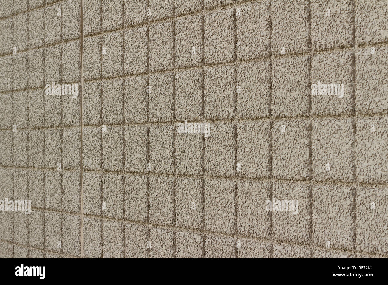 Conglomerate stone look is featured in this beige color square brick ...