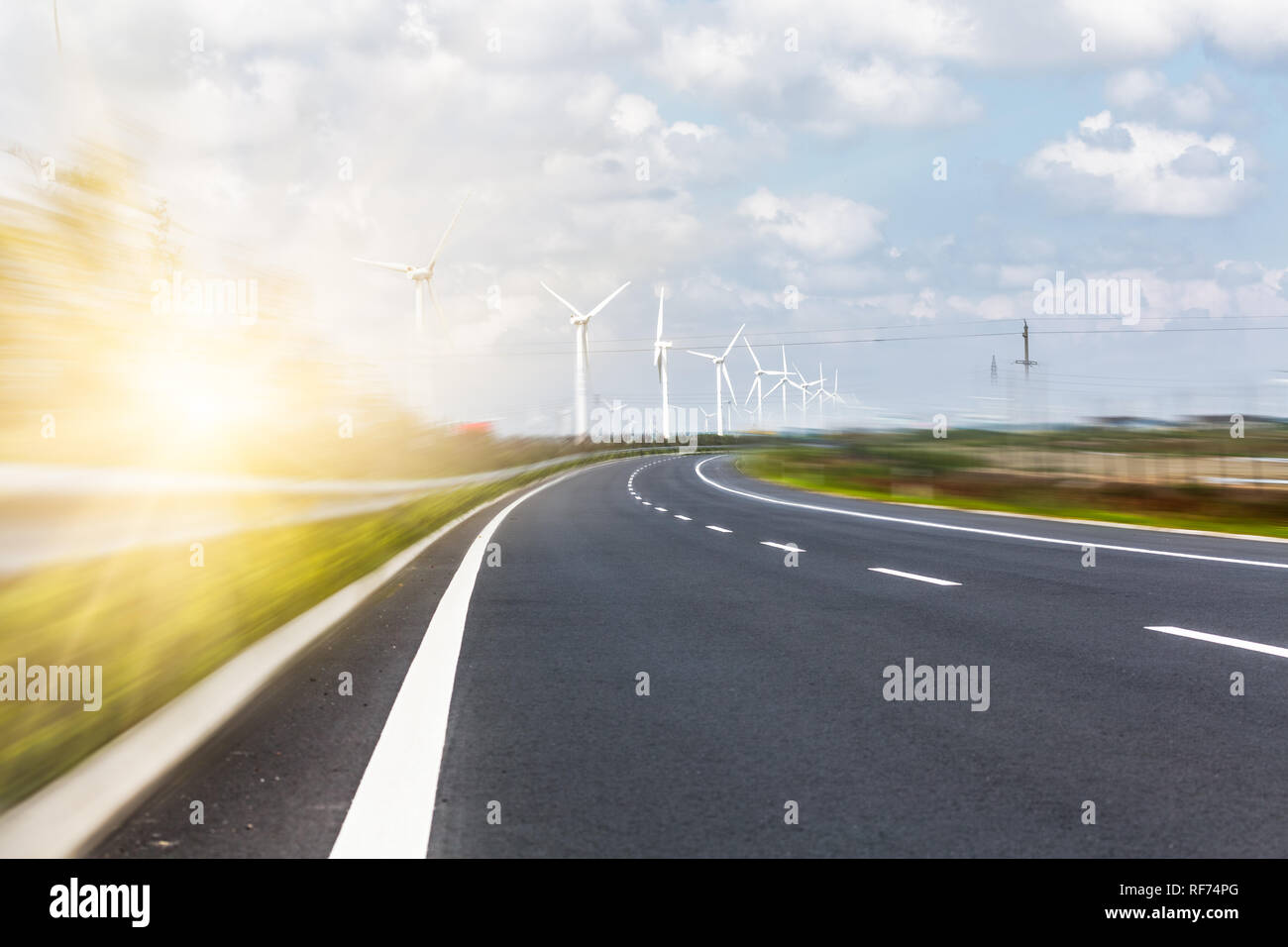Empty road and wind turbine hi-res stock photography and images - Alamy