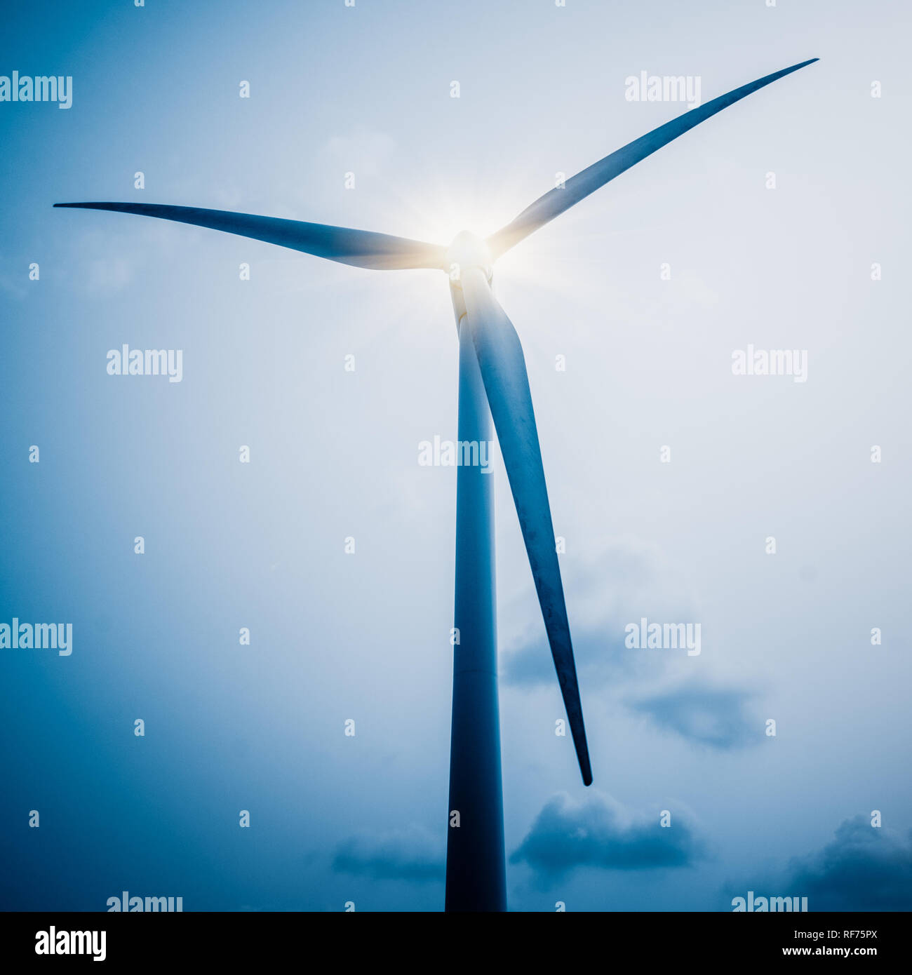 wind generators aganist the blue sky, blue toned Stock Photo - Alamy