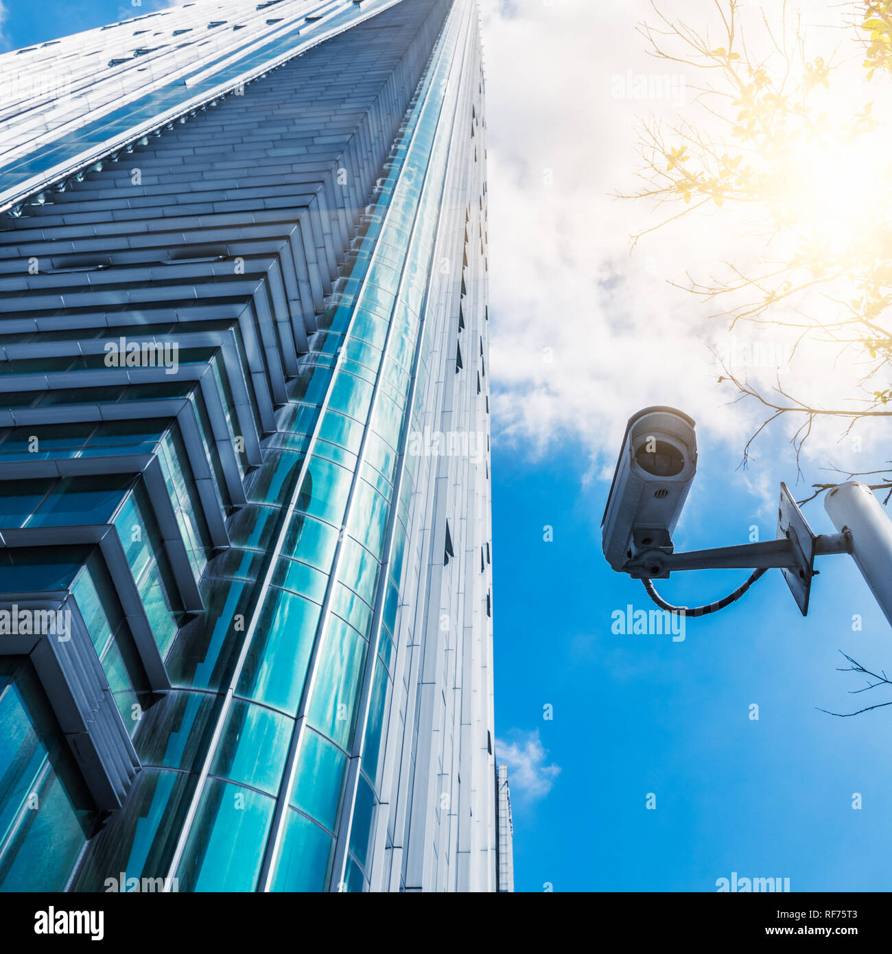 low angle shot on security camera with office building background ...