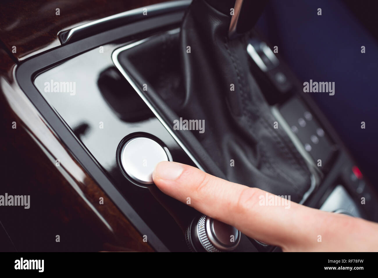 Finger pressing a button Stock Photo - Alamy