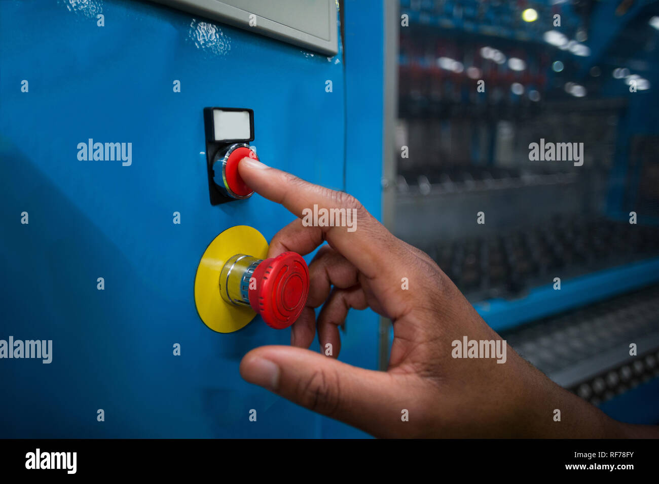 Hand pressing a red button Stock Photo - Alamy
