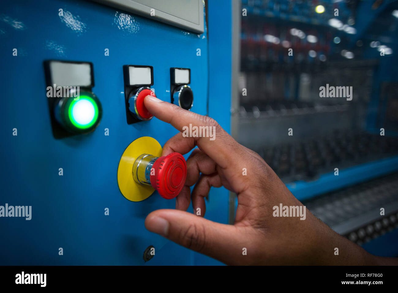 Hand pressing a red button Stock Photo - Alamy
