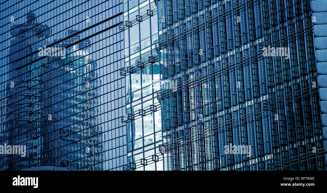 facade of modern office building, blue toned images Stock Photo - Alamy