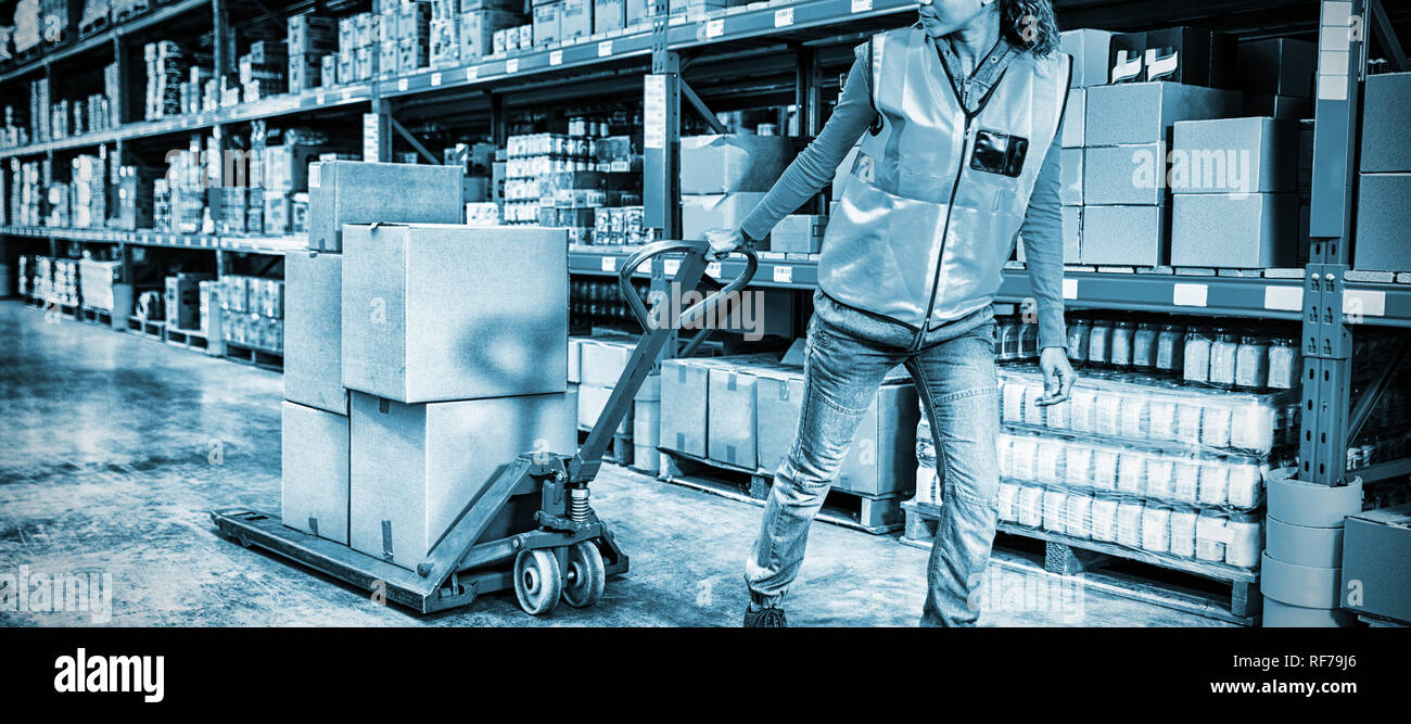 Pushing trolley hi-res stock photography and images - Alamy