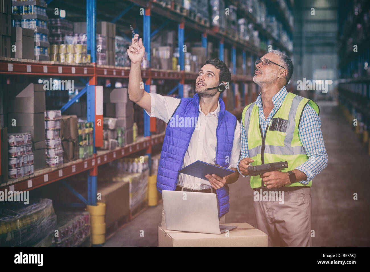 Worker colleague looking up Stock Photo - Alamy