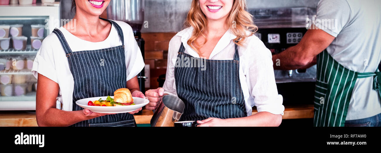 Working at counter hi-res stock photography and images - Alamy