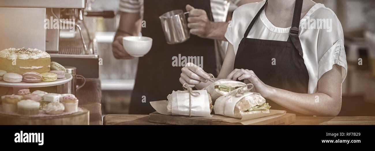 Man behind counter hi-res stock photography and images - Alamy