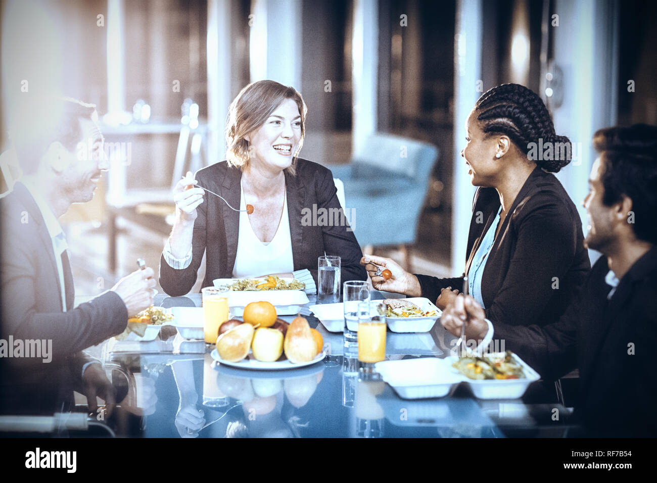 Group of business people having breakfast together Stock Photo - Alamy
