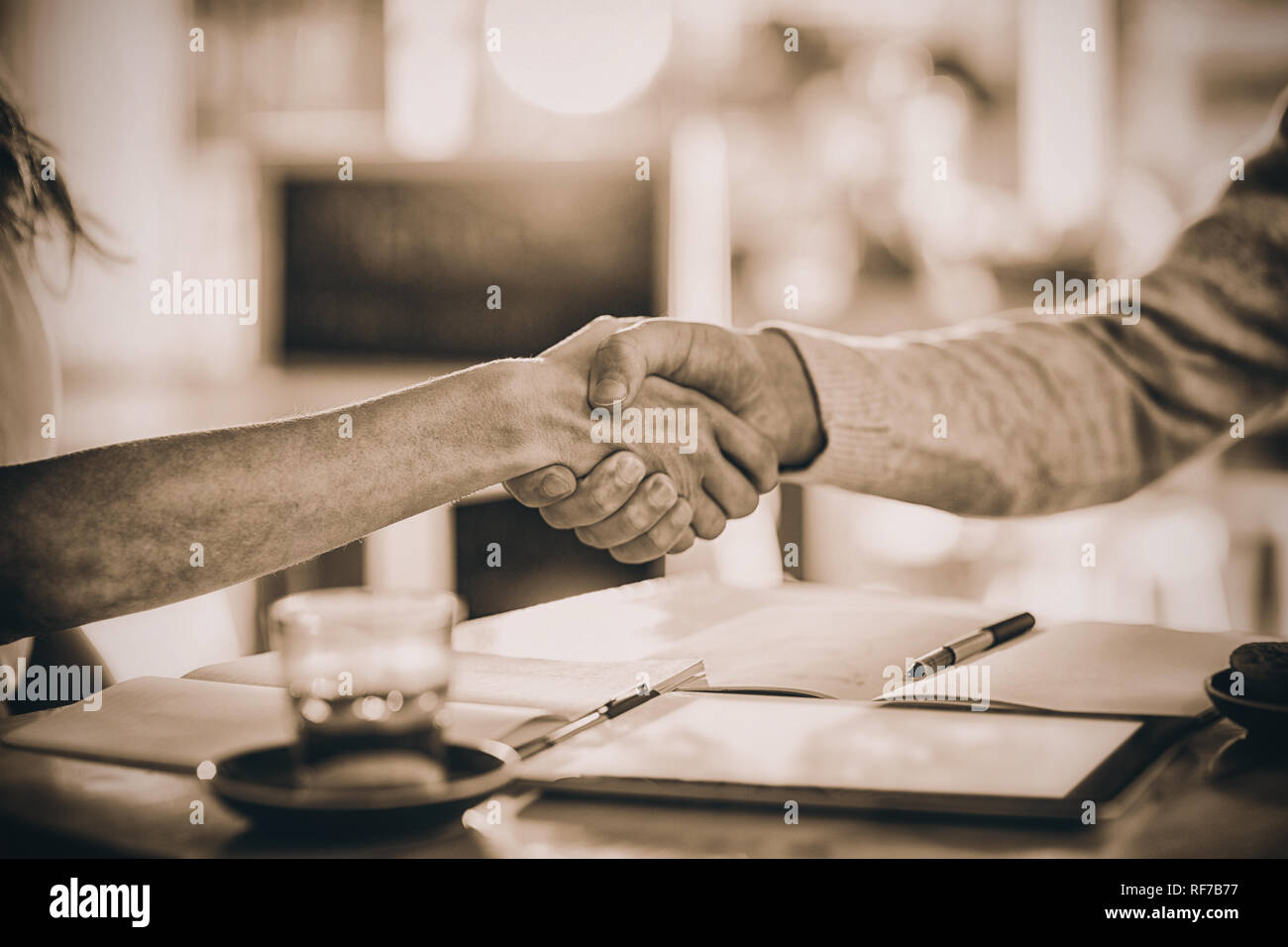 Friends hand shake hi-res stock photography and images - Alamy