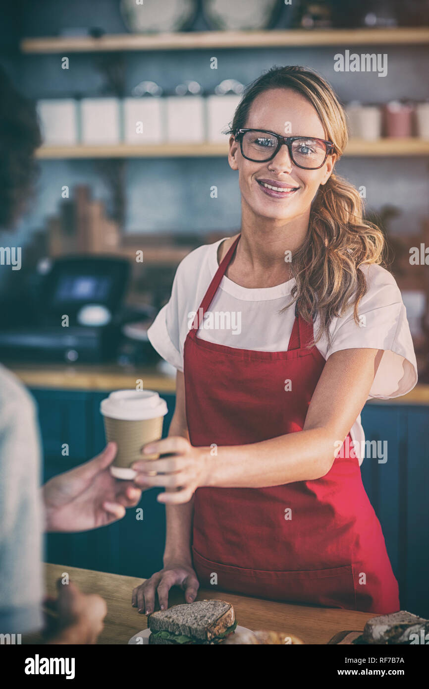 Pretty blonde waitress serving hi-res stock photography and images - Alamy