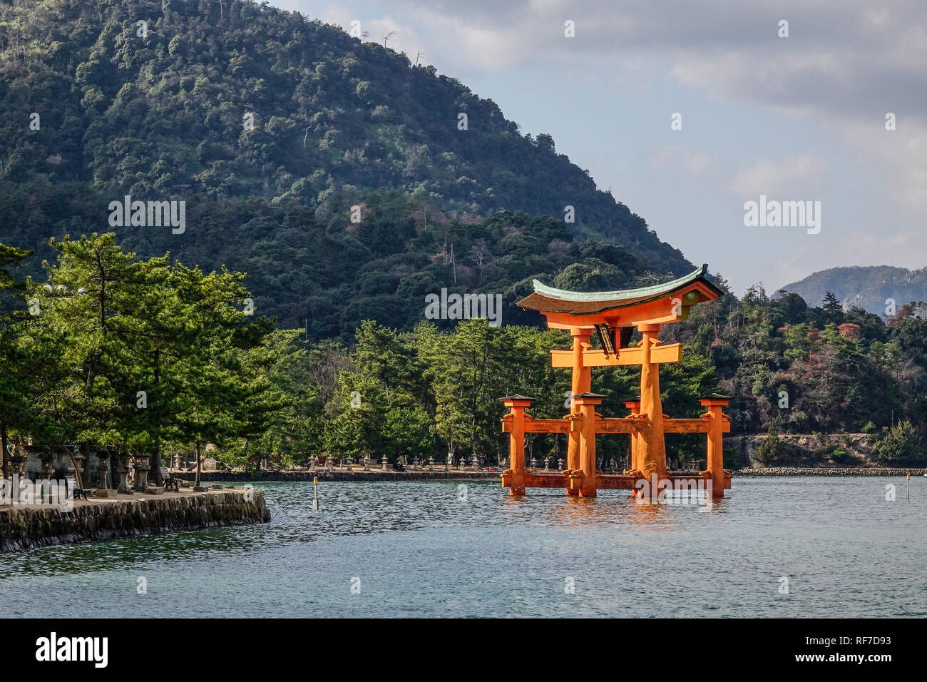 View of floating gate (Giant Torii) of Itsukushima Shrine on sea in ...