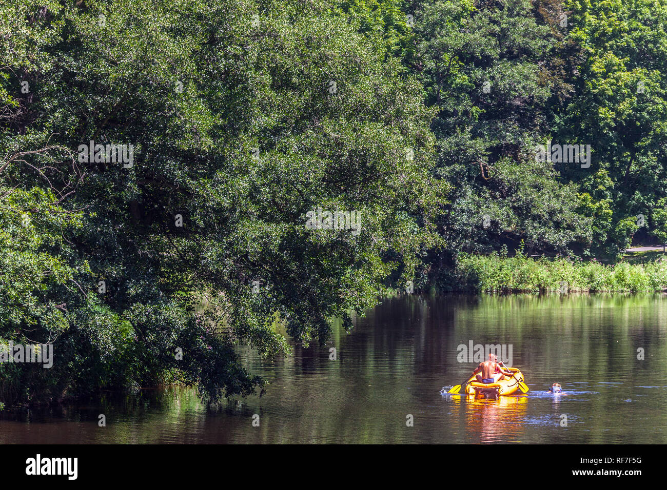 Active people on raft going down river Otava, South Bohemia, Czech ...