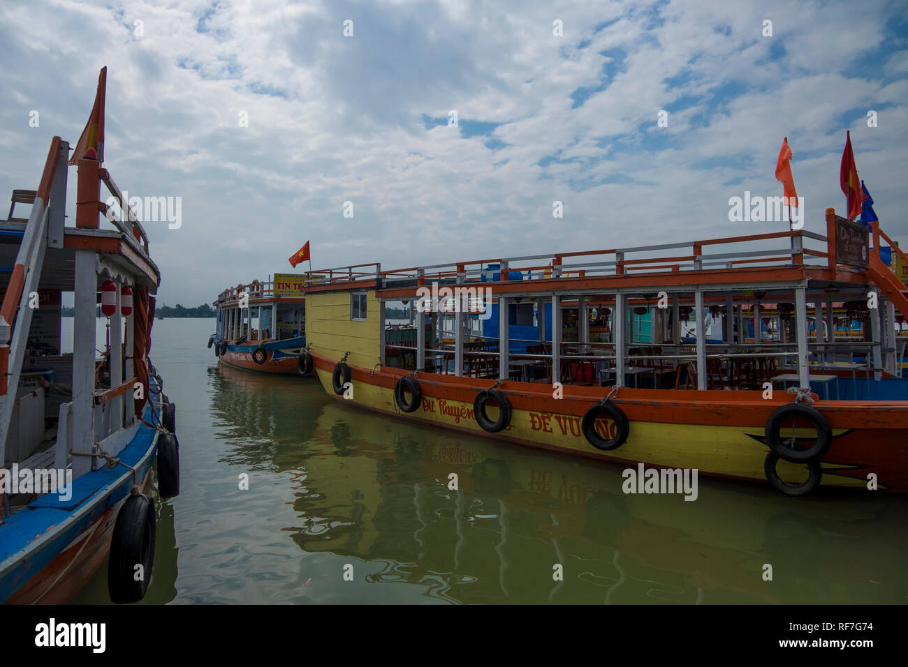 Day boats on the Thu Bon River in Hoi An, Vietnam Stock Photo - Alamy