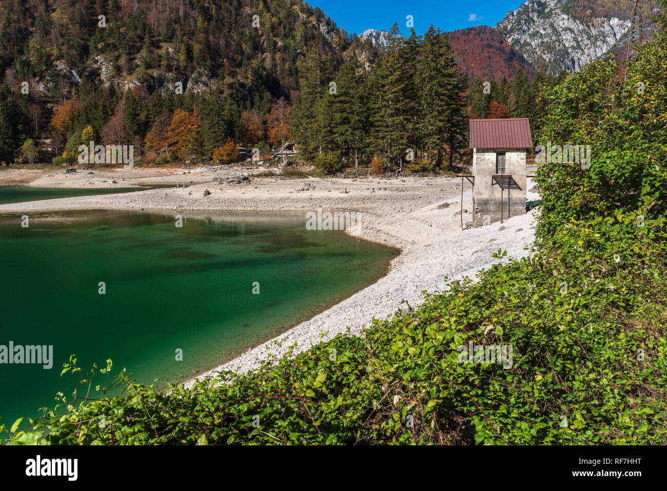 Warm autumn colors on the lake of Predil. Tarvisio, Friuli Stock Photo ...