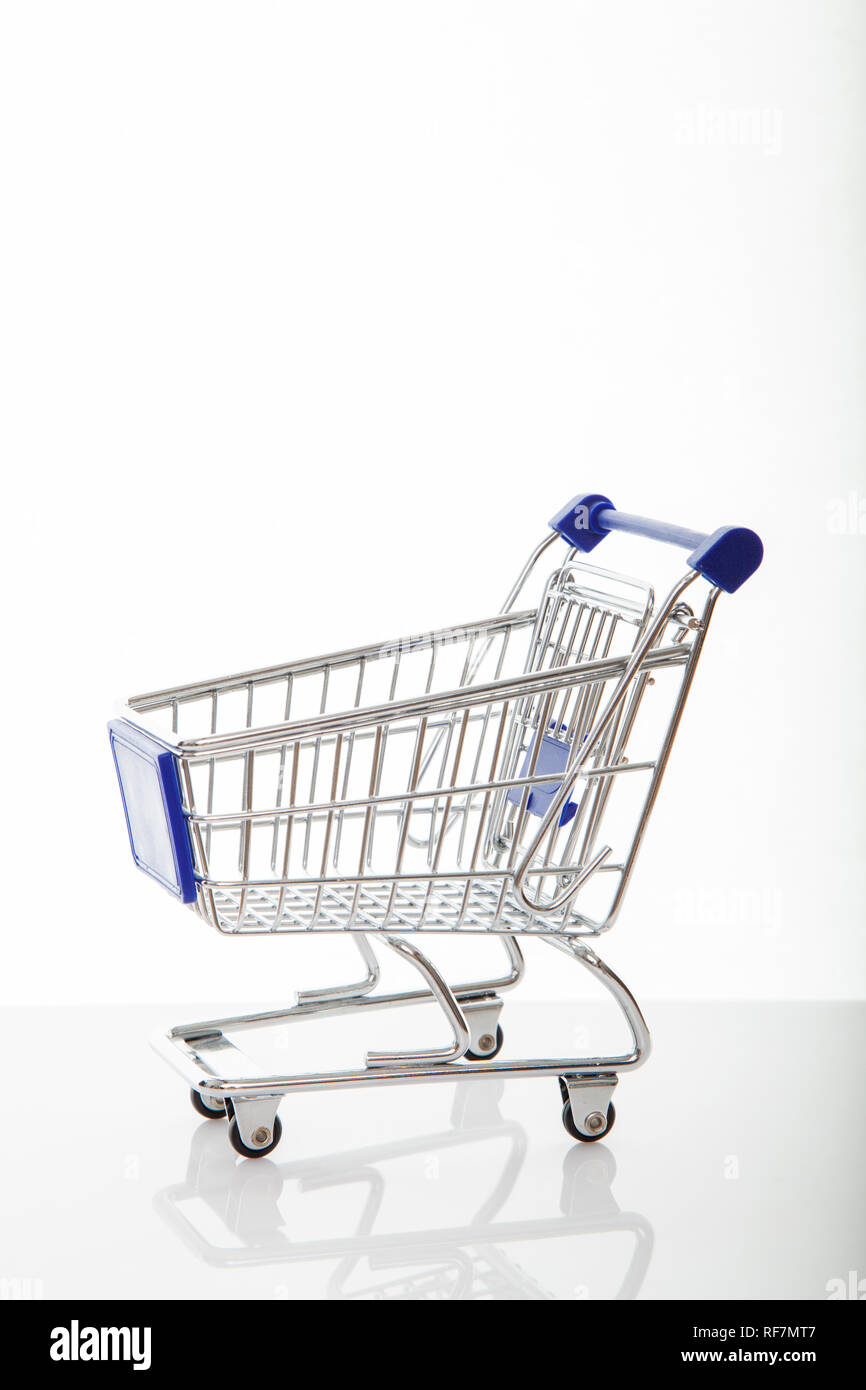 Mini shopping cart, Isolated photo Stock Photo - Alamy