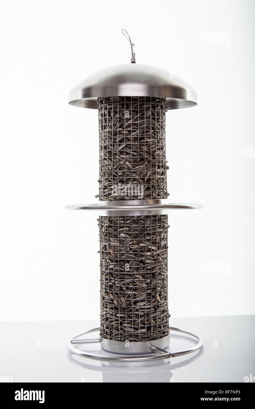 Stainless steel bird feeders, Isolated photo Stock Photo - Alamy
