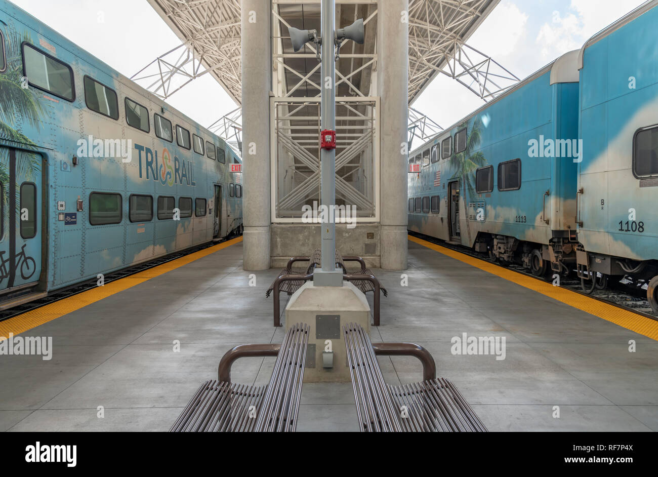 The new Tri-Rail station and trains at Miami Airport. The railway route ...