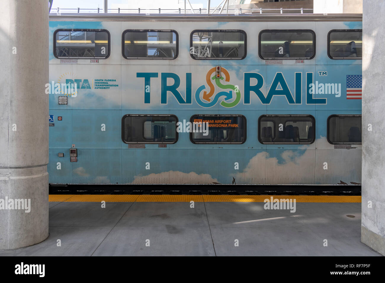 The new Tri-Rail station and trains at Miami Airport. The railway route ...