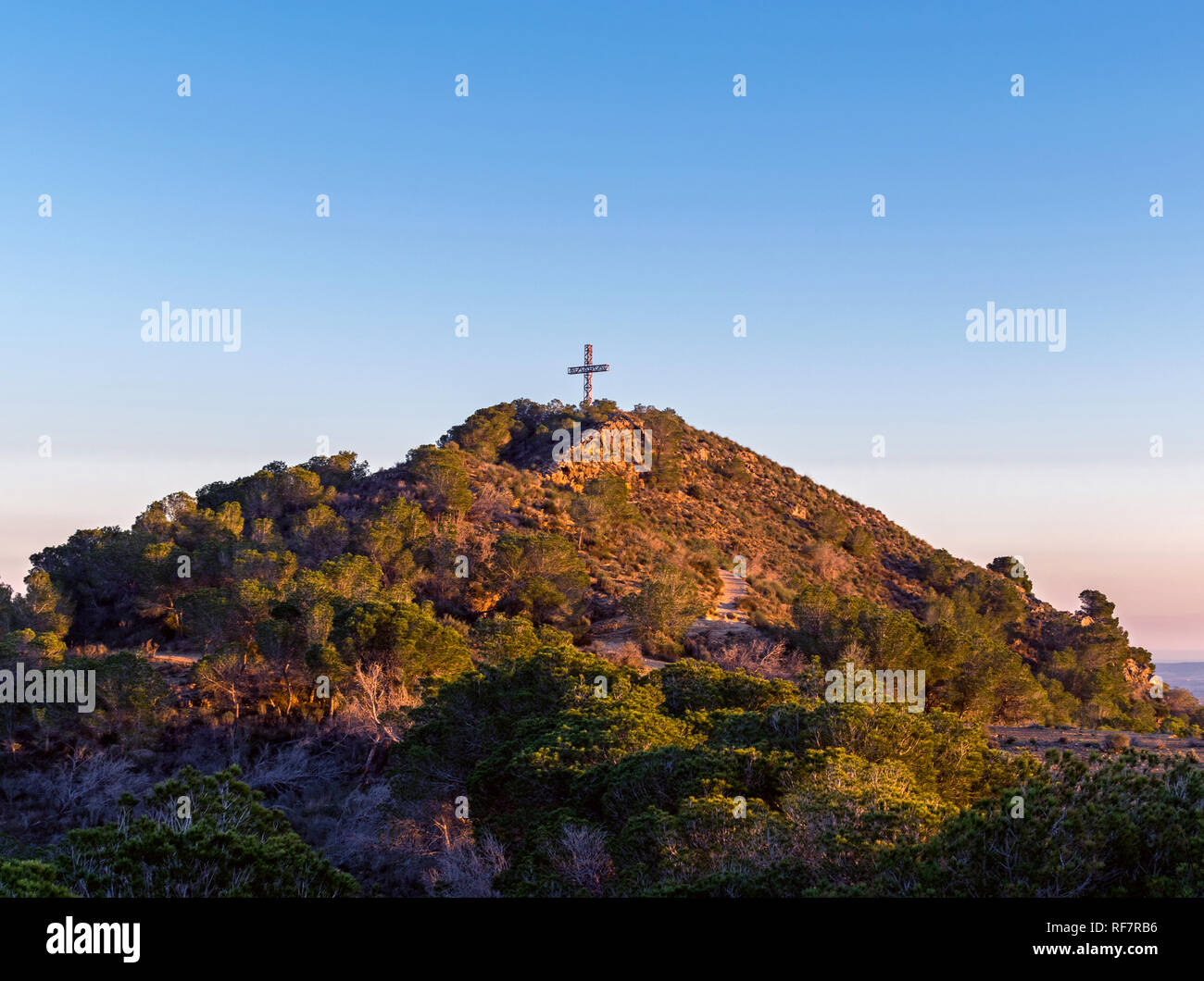 Pilgrimage trip to the cross at the top of the mountain Stock Photo - Alamy