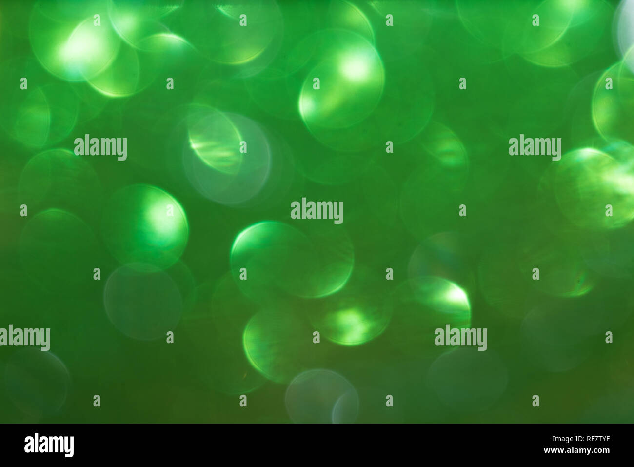 Green defocused flickering lights for text and background Stock Photo ...
