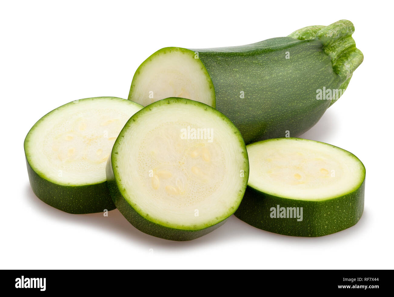 sliced courgette path isolated Stock Photo - Alamy