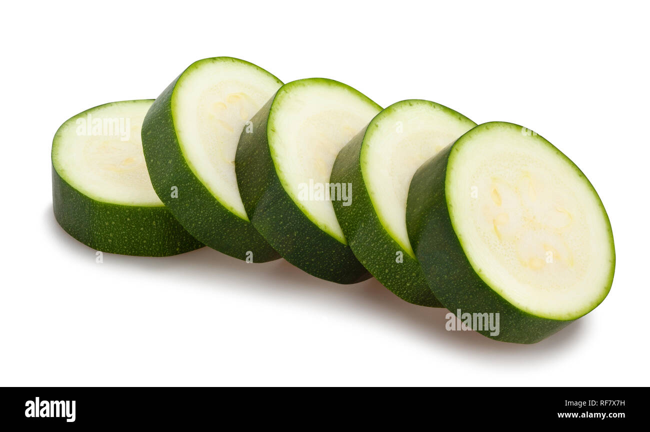 sliced courgette path isolated Stock Photo - Alamy