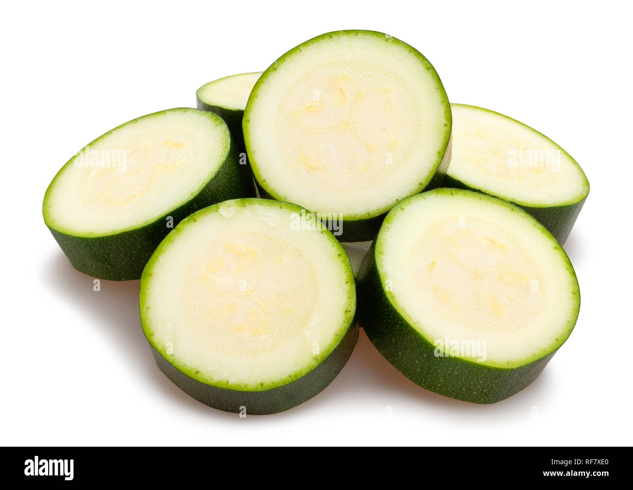 sliced courgette path isolated Stock Photo - Alamy