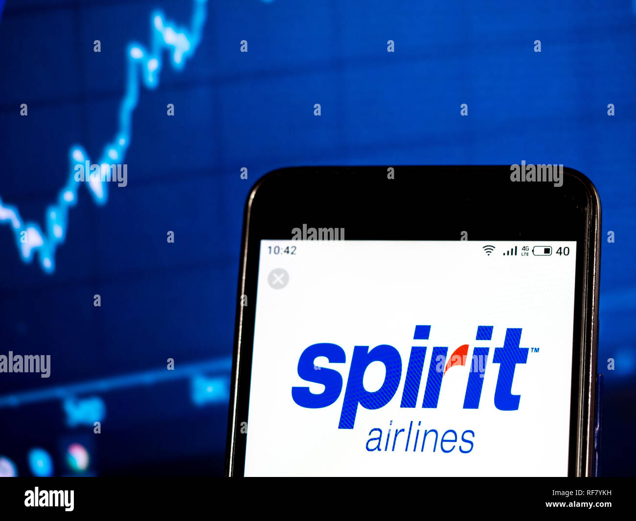 Spirit Airlines, Commercial airline logo seen displayed on smart phone ...