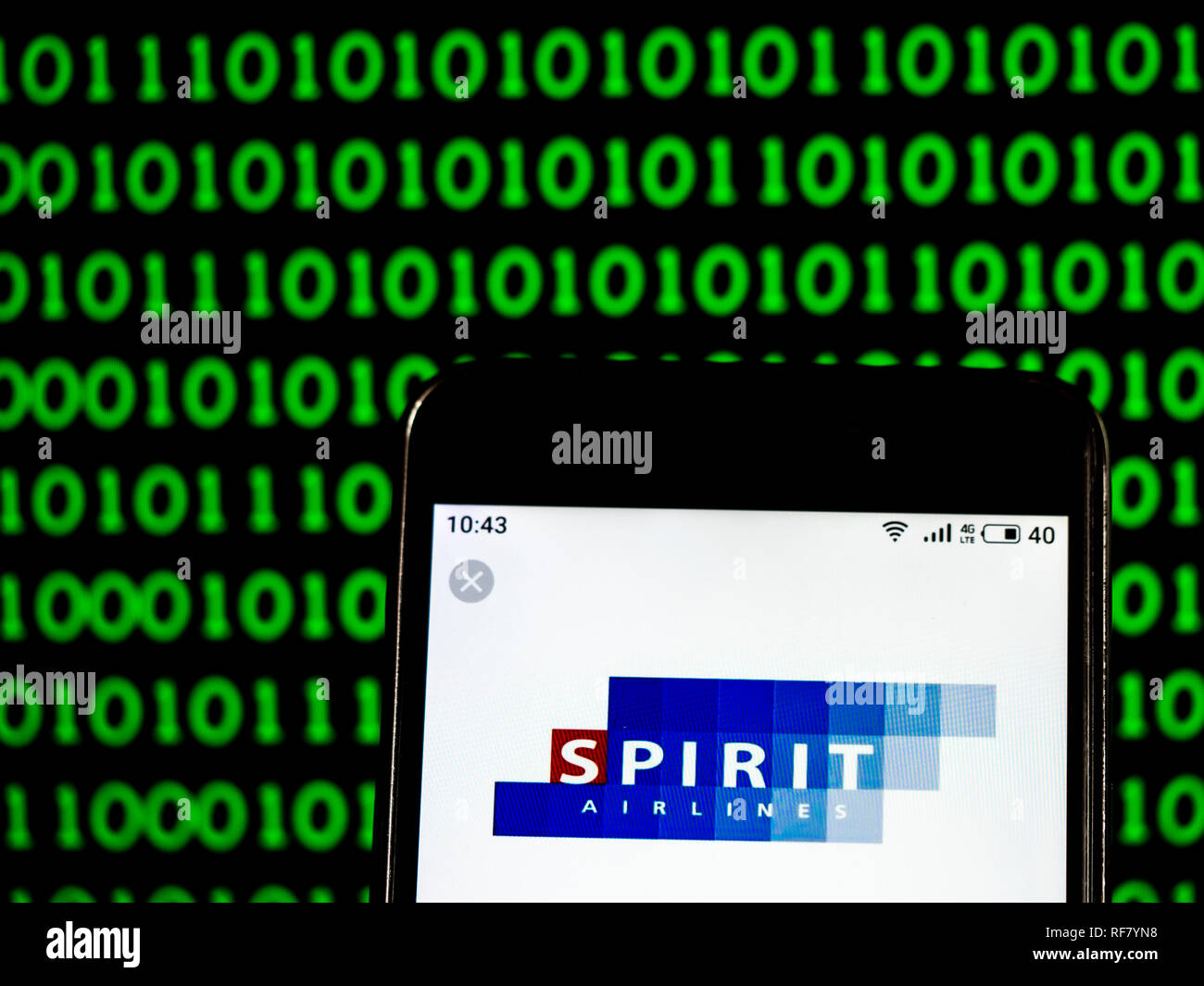 Spirit Airlines, Commercial airline logo seen displayed on smart phone ...