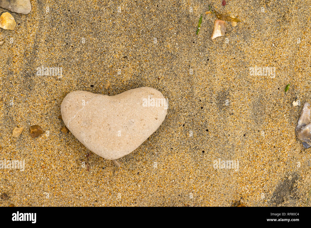 Pebble heart in water hi-res stock photography and images - Alamy