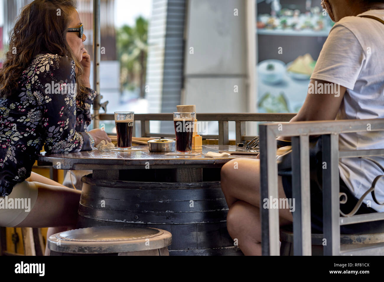 Asian drinking guinness hi-res stock photography and images - Alamy
