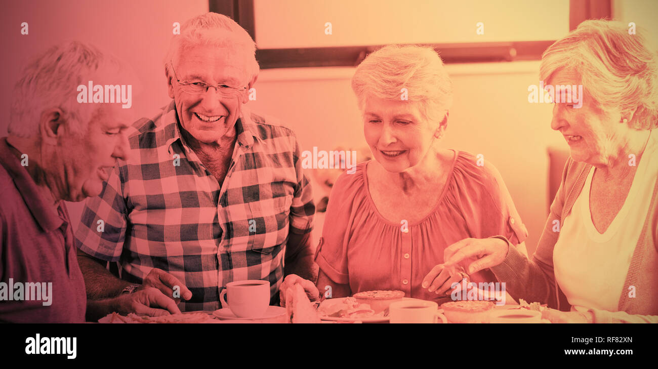 Seniors having lunch together Stock Photo - Alamy