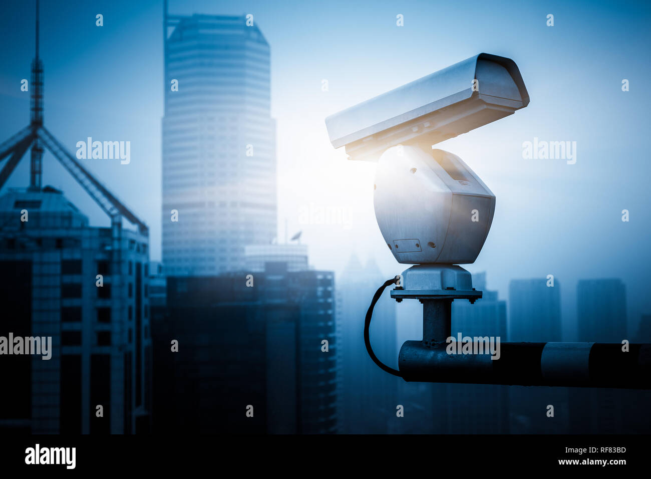 low angle shot on security camera with office building background ...