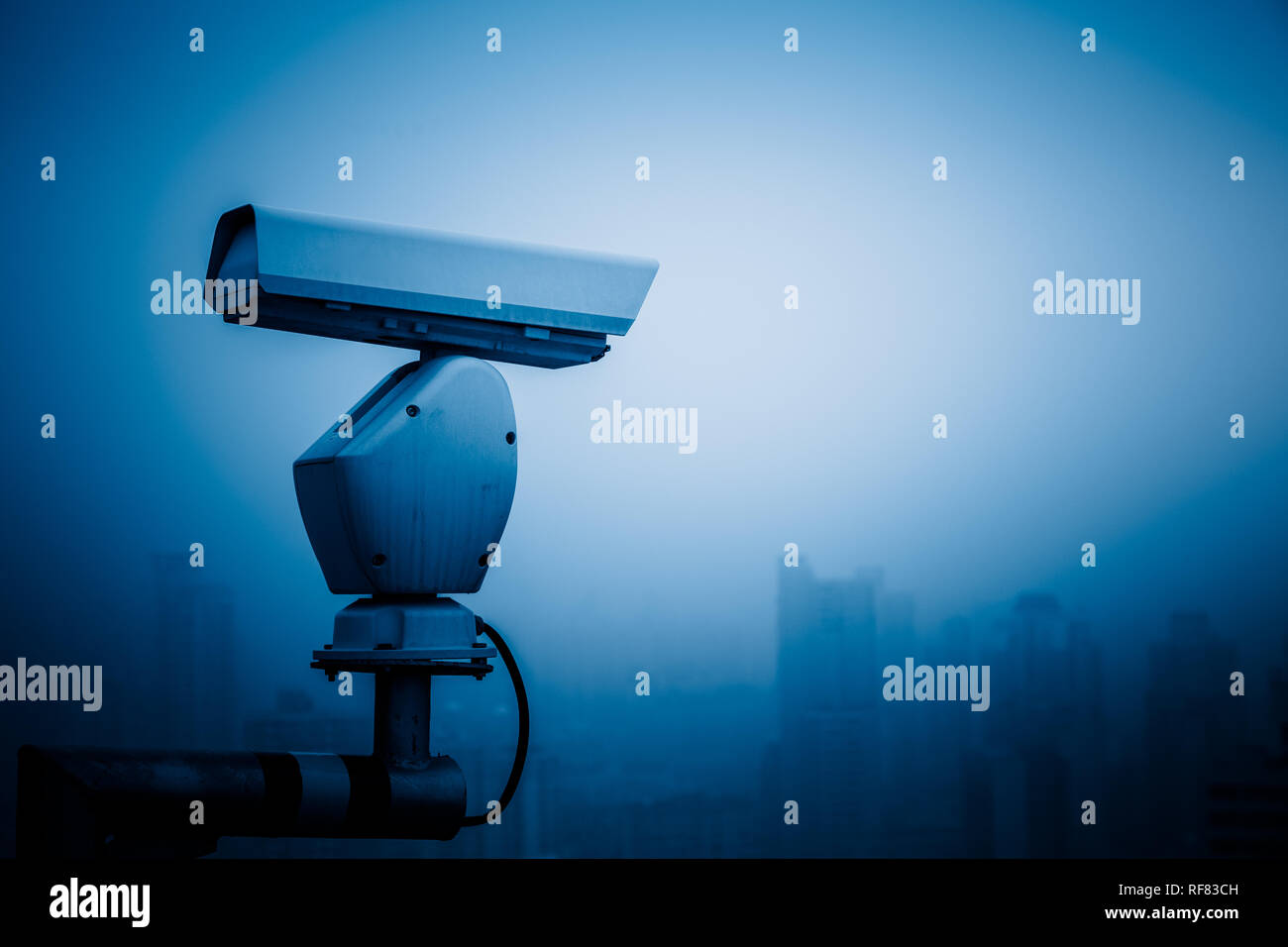 low angle shot on security camera with office building background ...