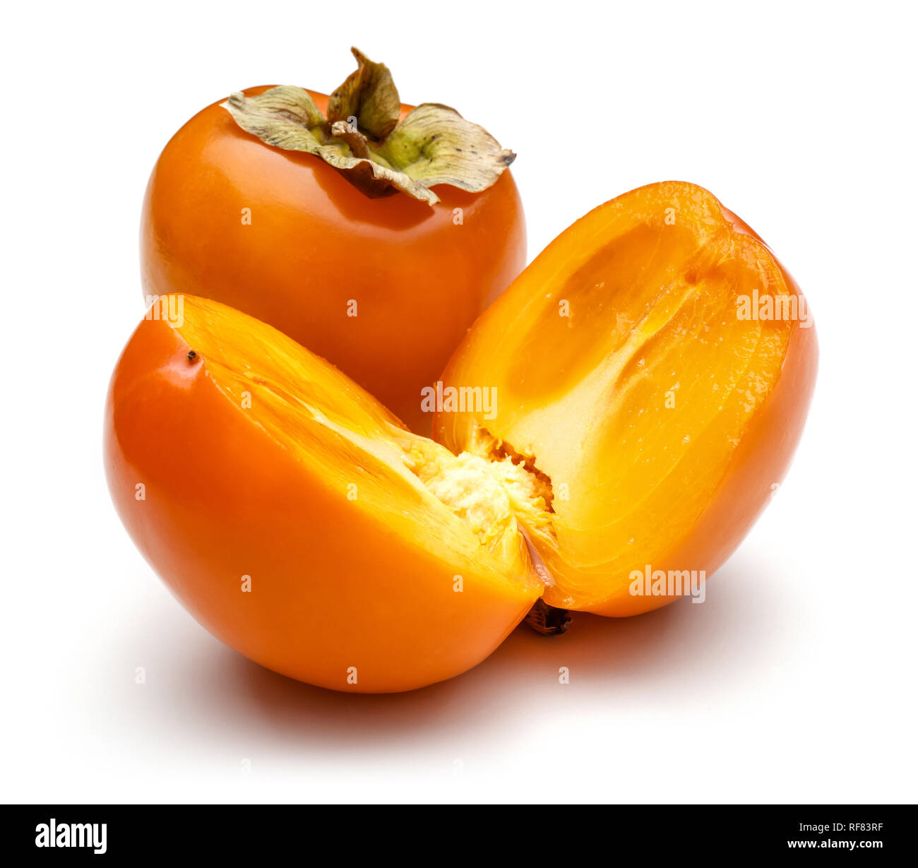 Whole and sliced persimmon fruit isolated on white background Stock ...