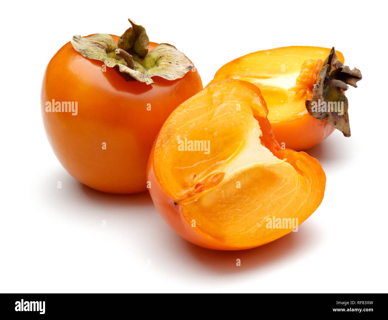 Whole and sliced persimmon fruit isolated on white background Stock ...