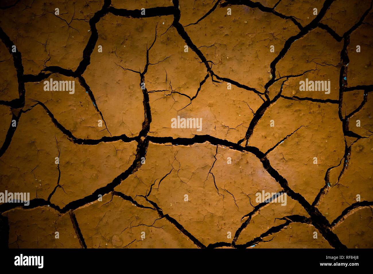 Dry land. Cracked ground background Stock Photo - Alamy