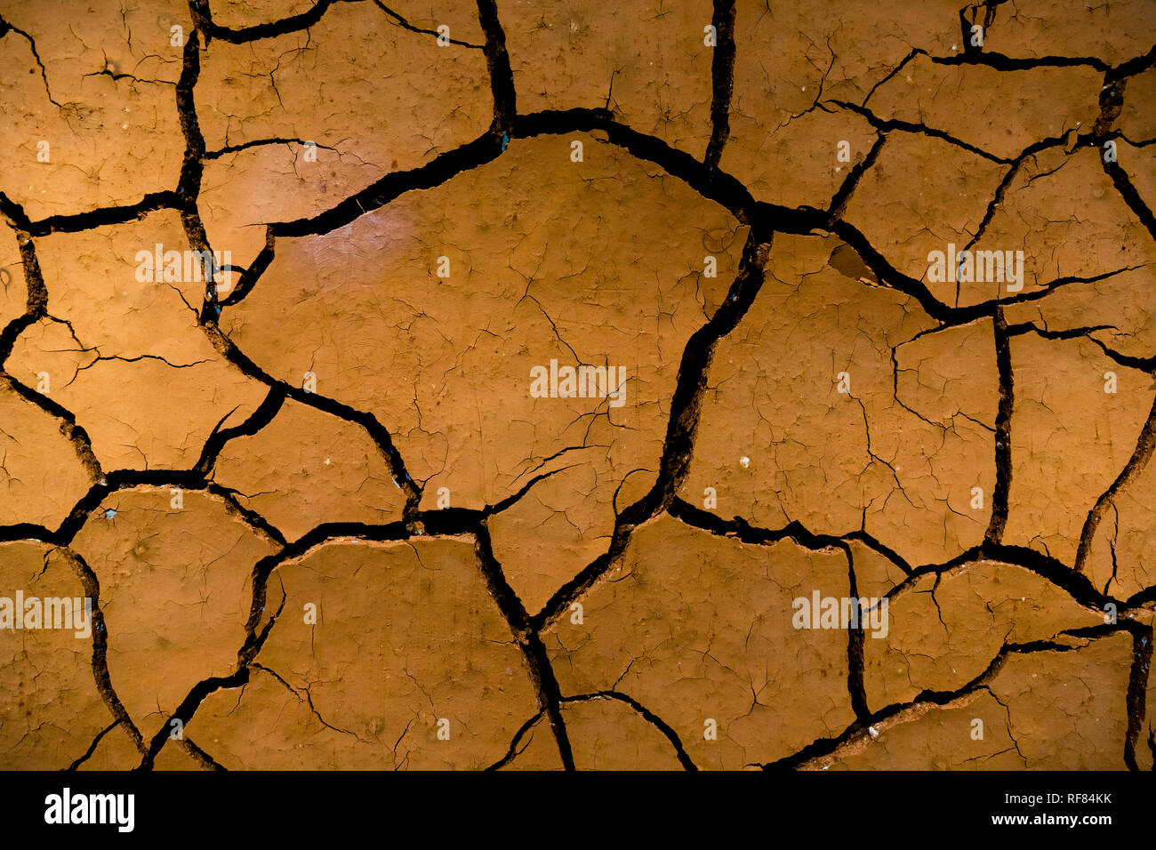 Dry land. Cracked ground background Stock Photo - Alamy